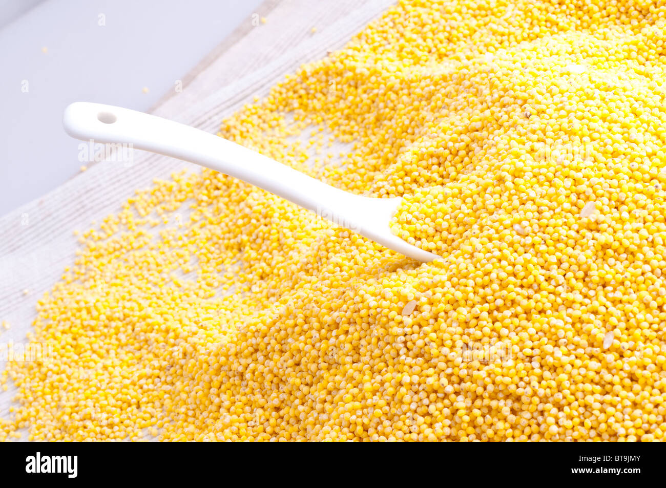 raw Millet in small sack Stock Photo - Alamy