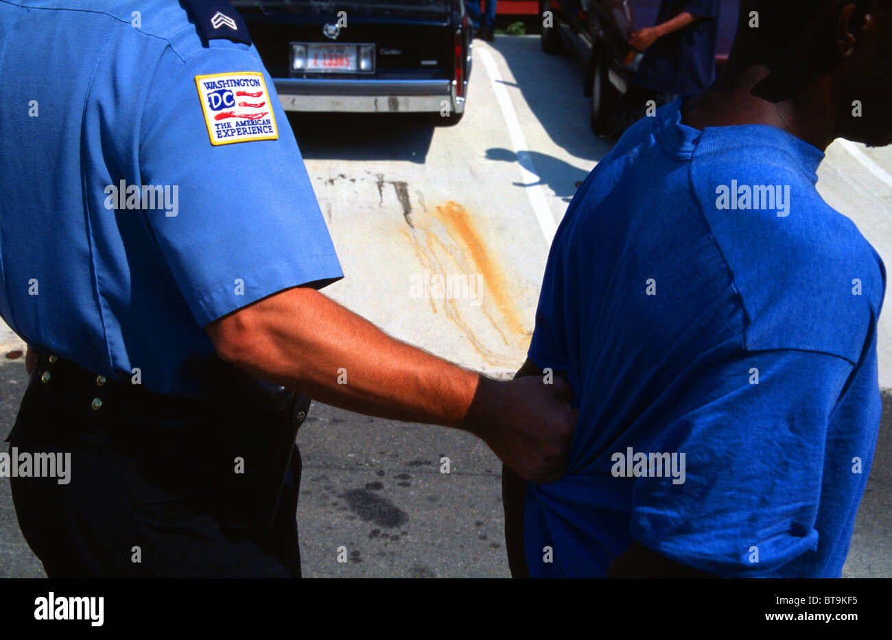 Police Detaining Stock Photos & Police Detaining Stock Images - Alamy