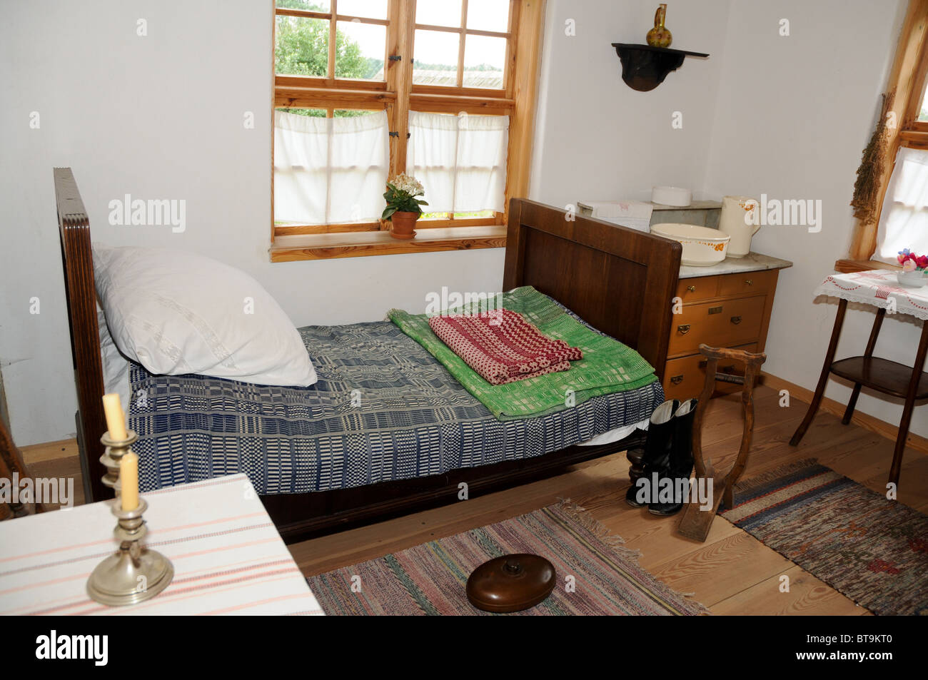 Bedroom inside old wooden hut, Masuria region in Poland Stock Photo - Alamy
