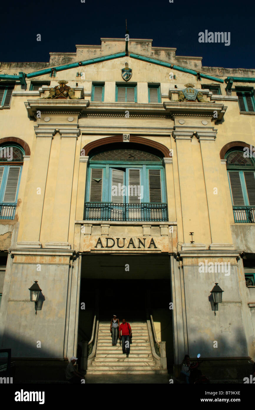 26th February 2009: A couple walk out of a building near Habana Bay ...