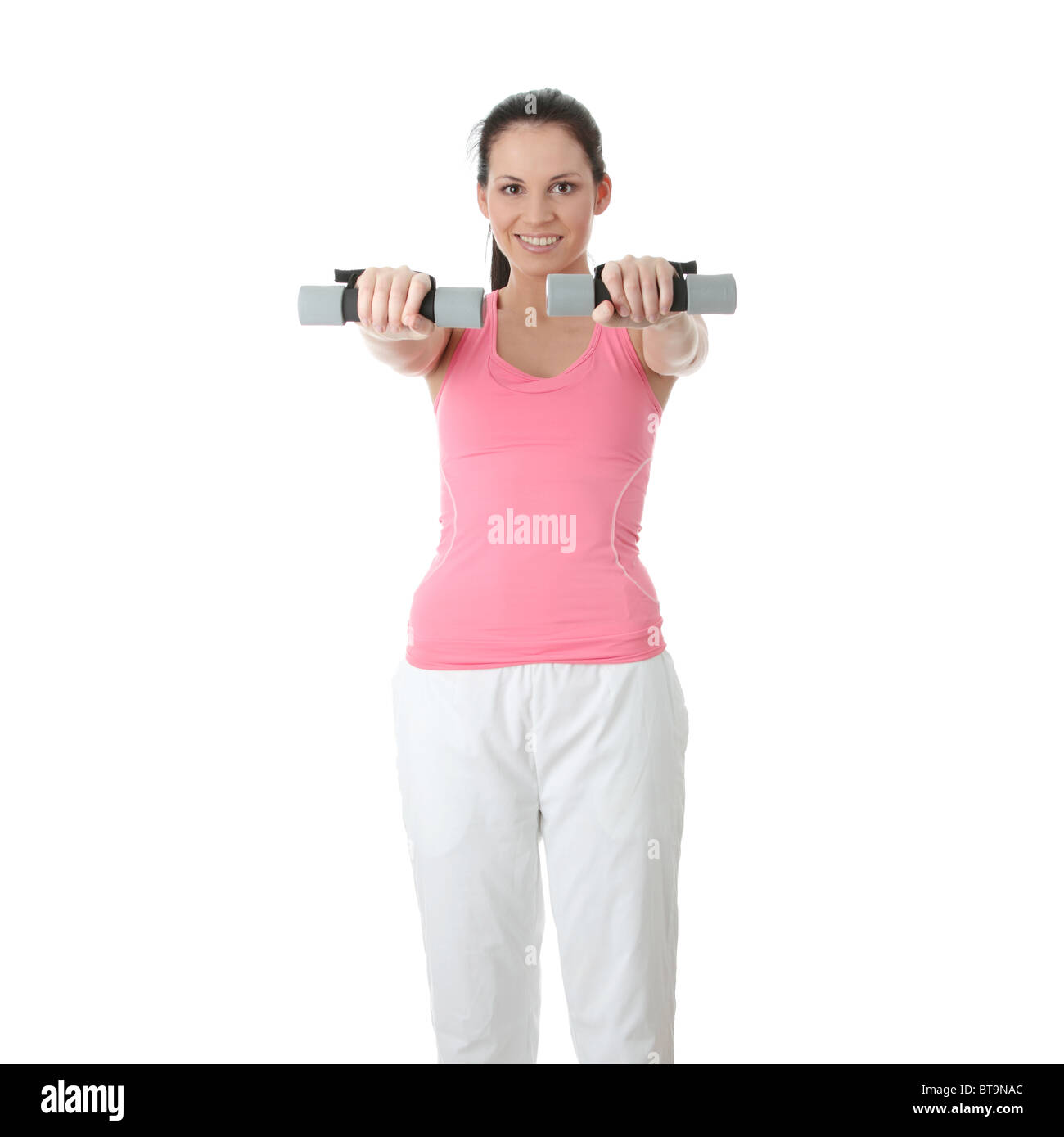 Beautiful young woman doing exercise with dumb bells , isolated Stock ...