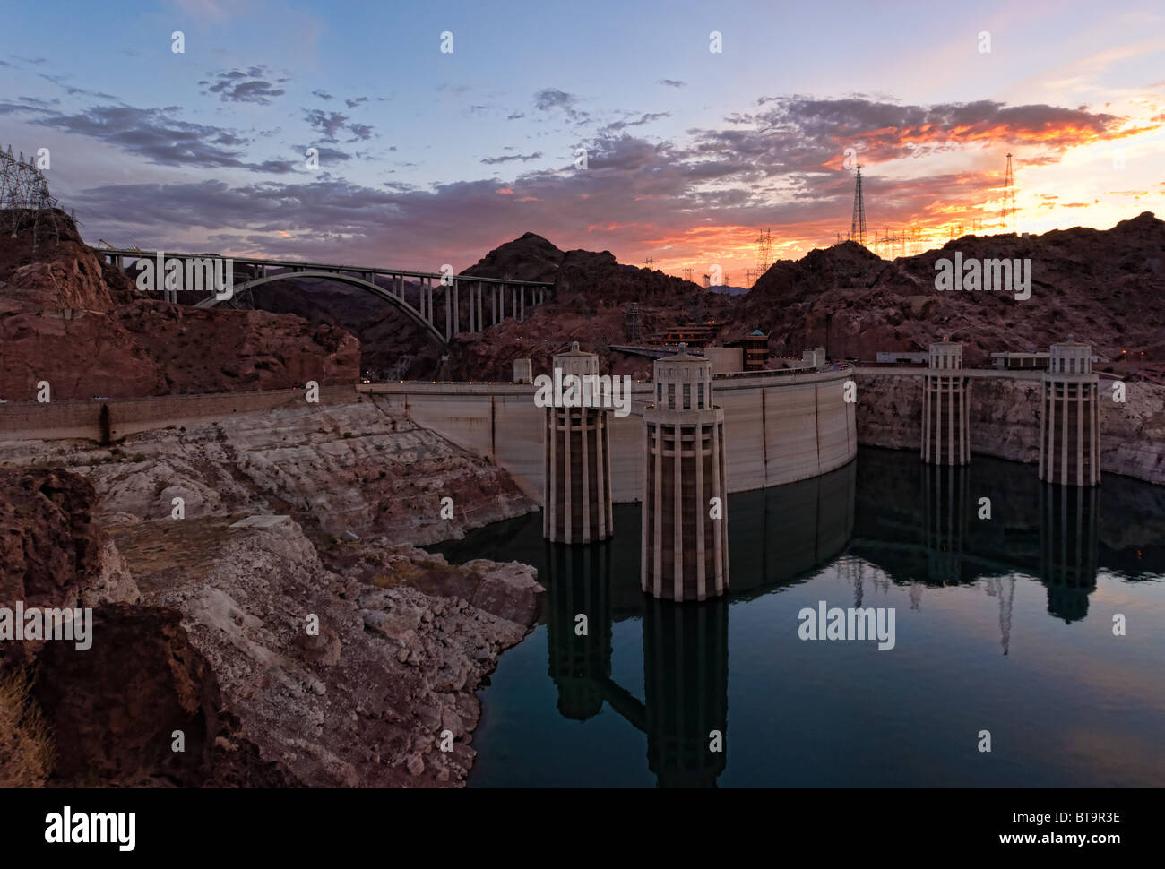 Hoover Dam and completed Hoover Dam Bridge at sunset Stock Photo - Alamy