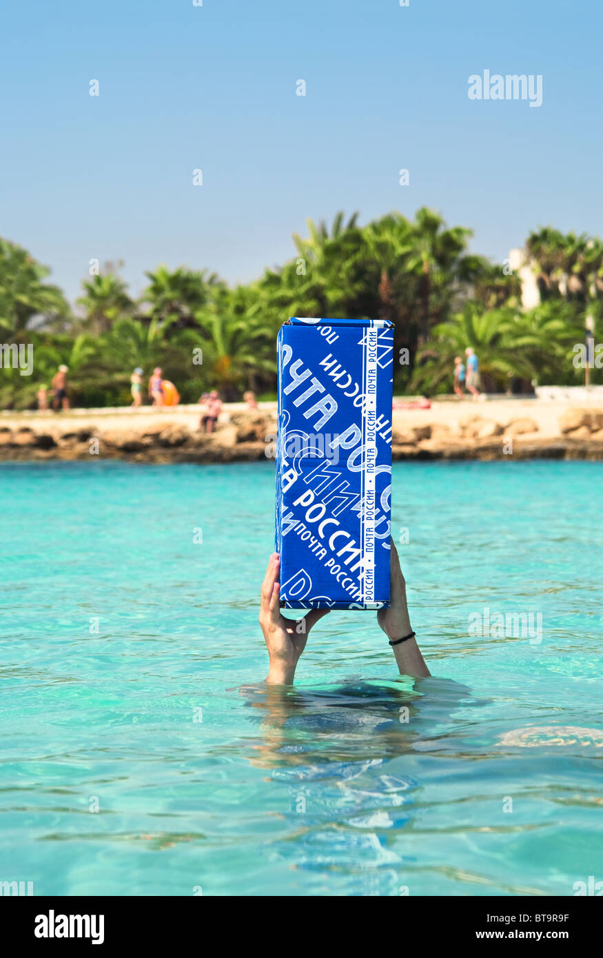 Blue mail boxes of Russia in the hands of a man drowning in the sea ...
