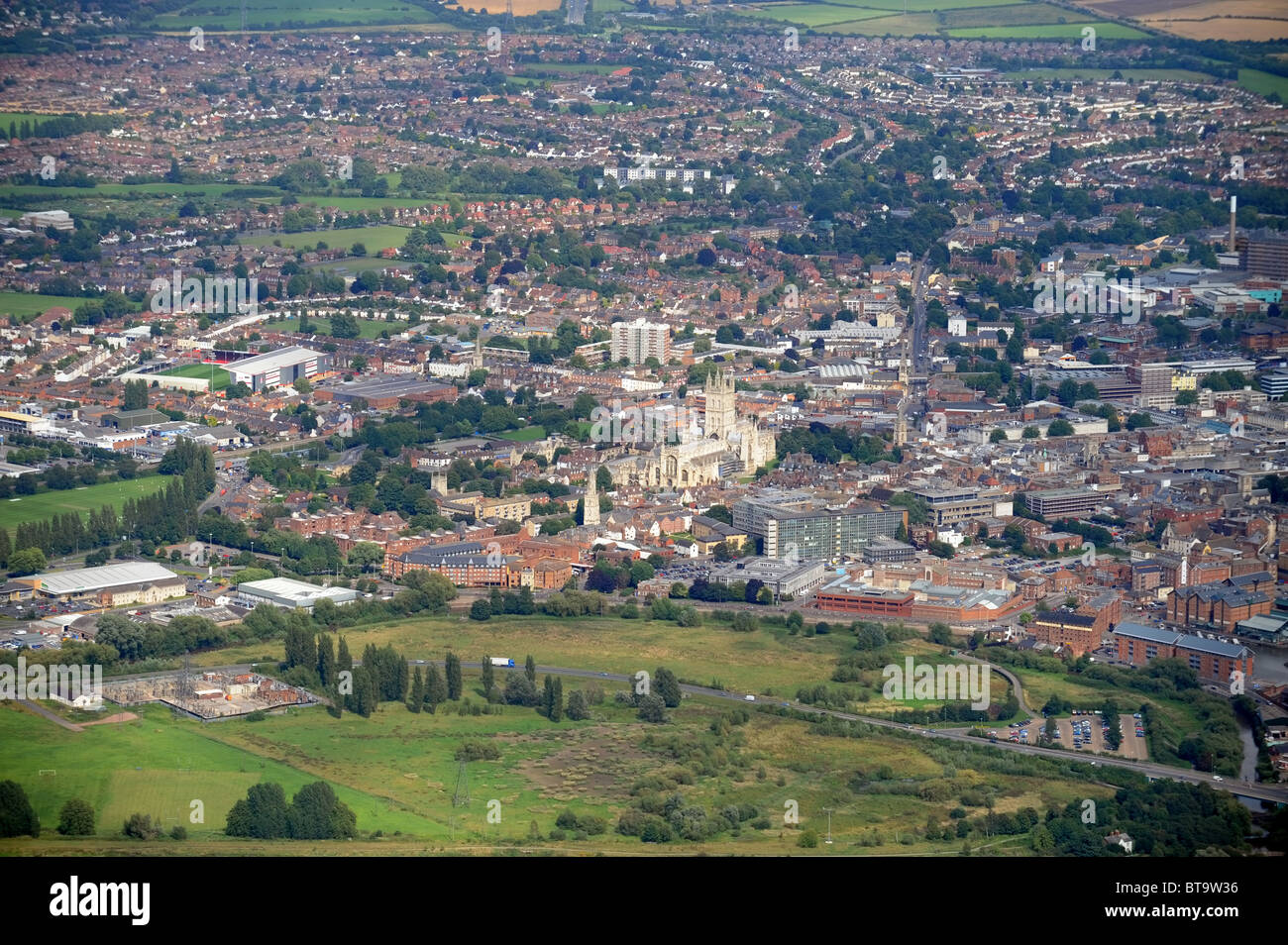Aerial view of Gloucester with Kingsholm rugby stadium (left) Cathedral ...