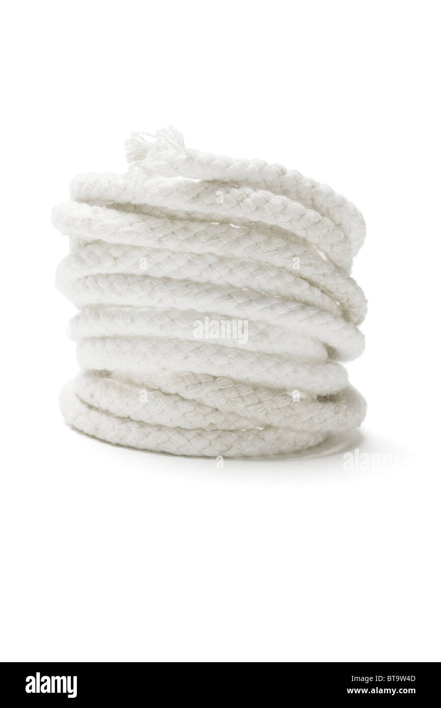 Coil of white rope on isolated background Stock Photo - Alamy