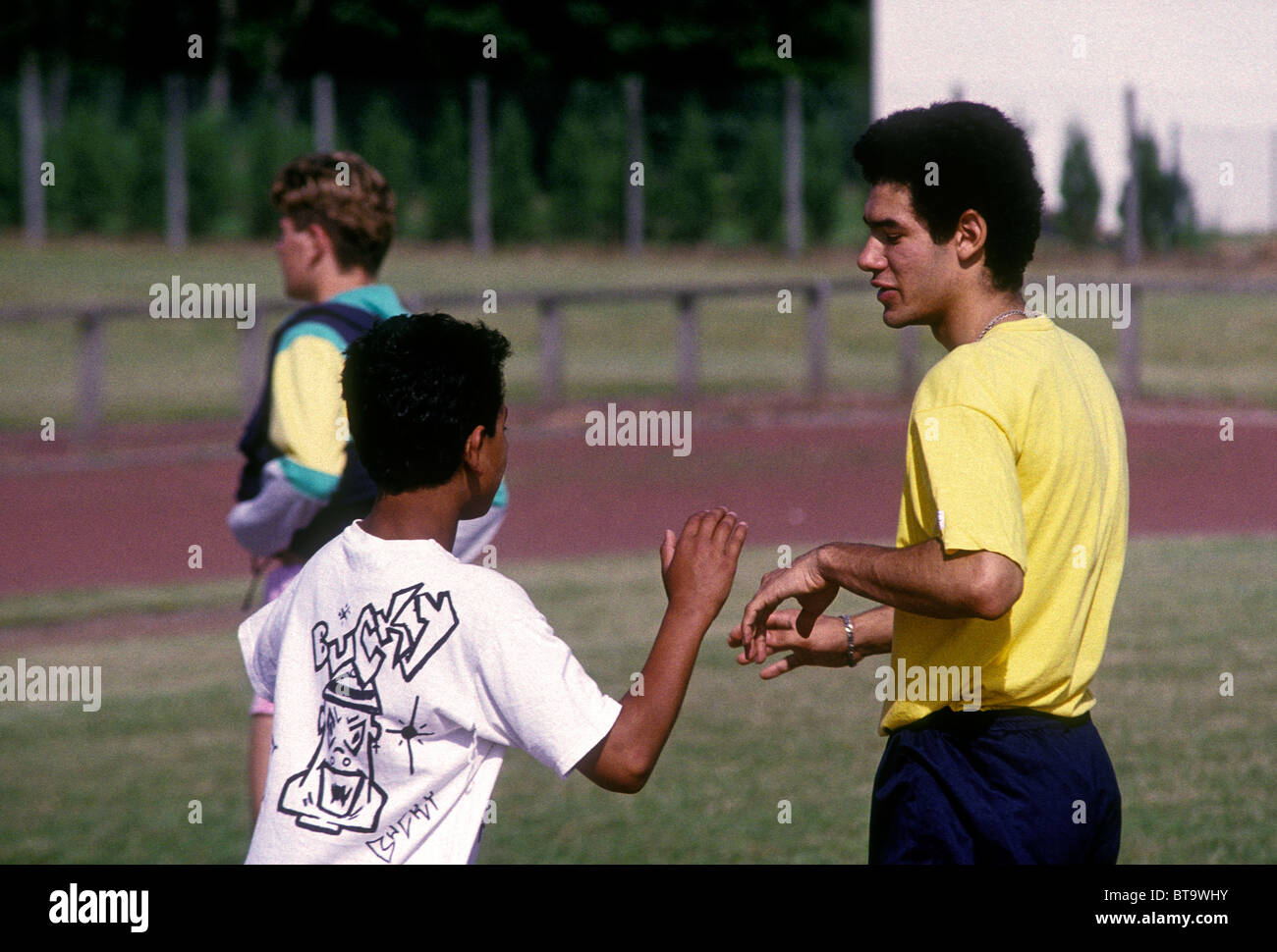 French students, gym class, playing soccer, soccer player, soccer ...
