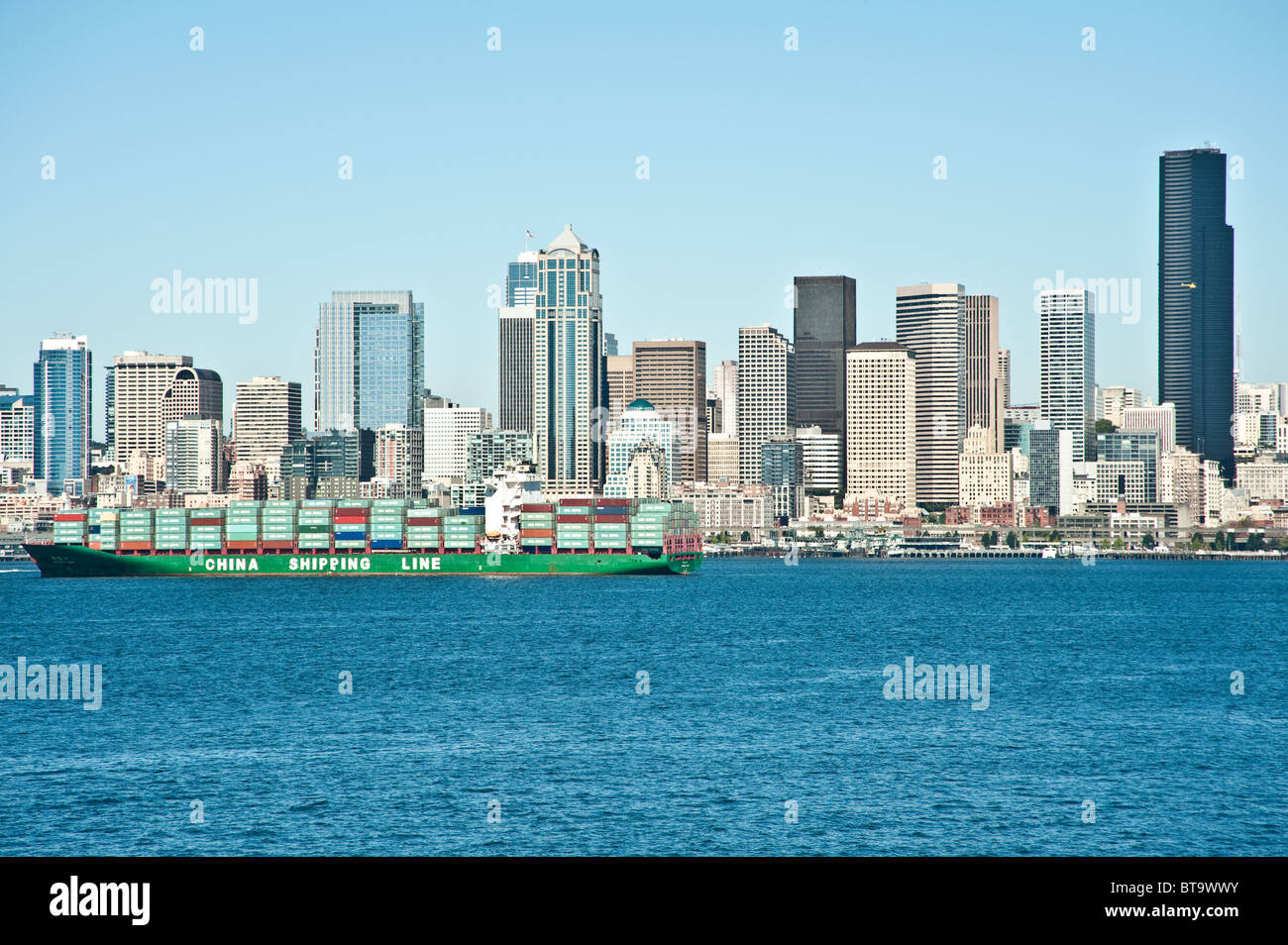 A container ship docking in front of Seattle downtown Stock Photo - Alamy