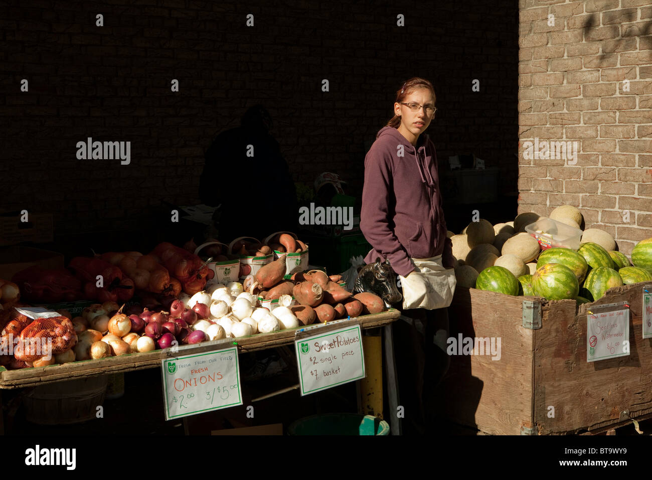 A young vendor at an outdoor stall at the north building of the St ...