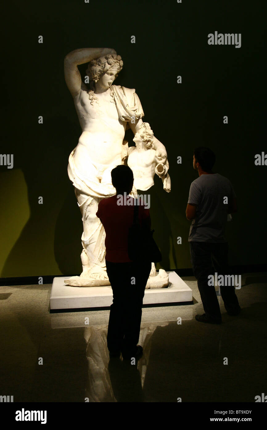 Tourists looking at Turkish stone sculpture in museum Stock Photo - Alamy