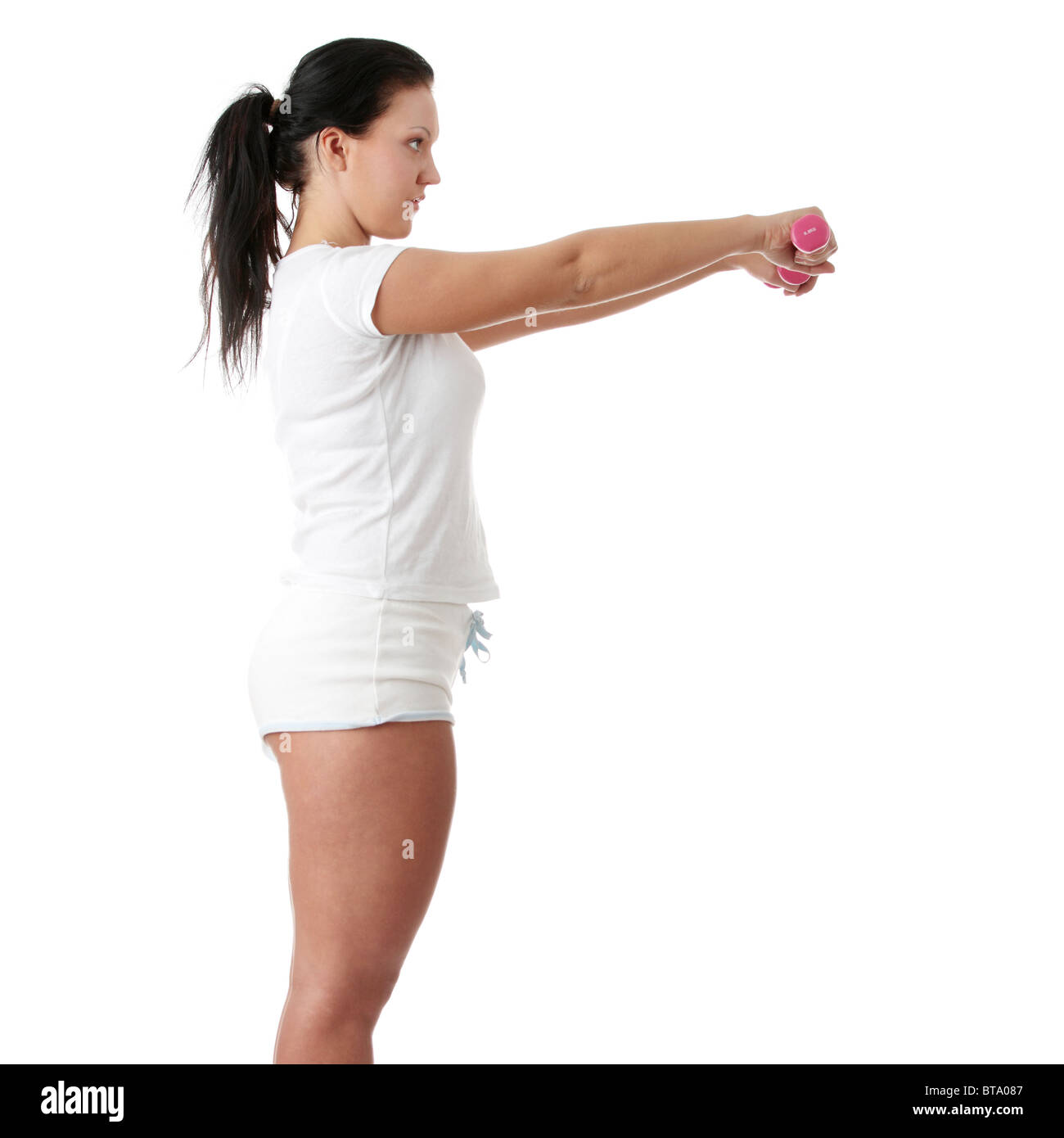 Young happy woman doing fitness exercises Stock Photo - Alamy