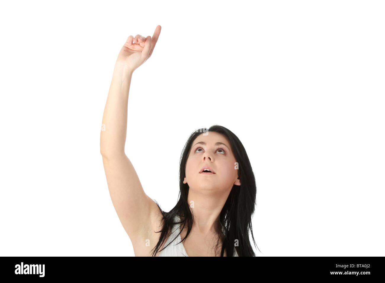 Woman pointing up at something. Isolated on white Stock Photo - Alamy