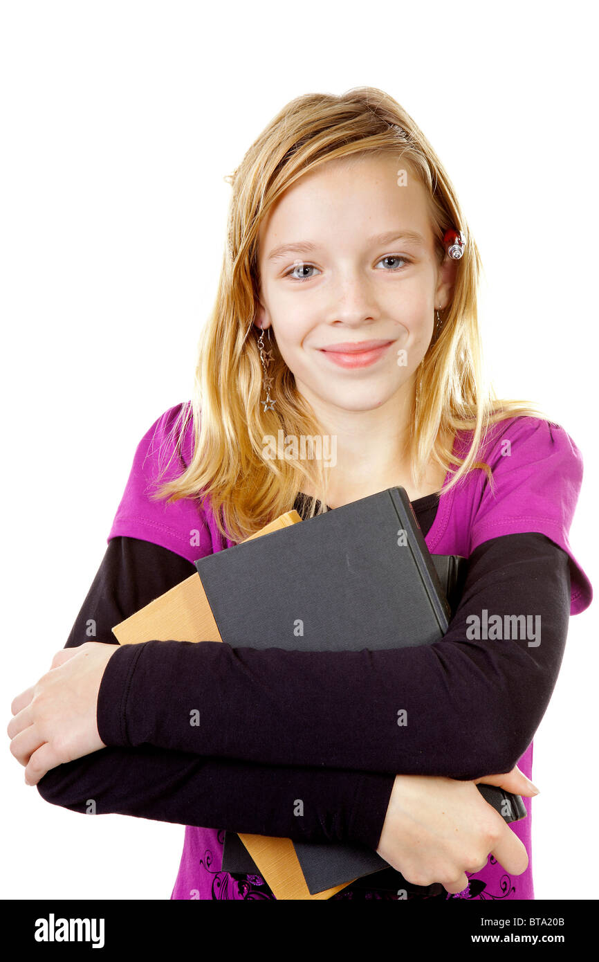 young girl carry books over white background Stock Photo - Alamy