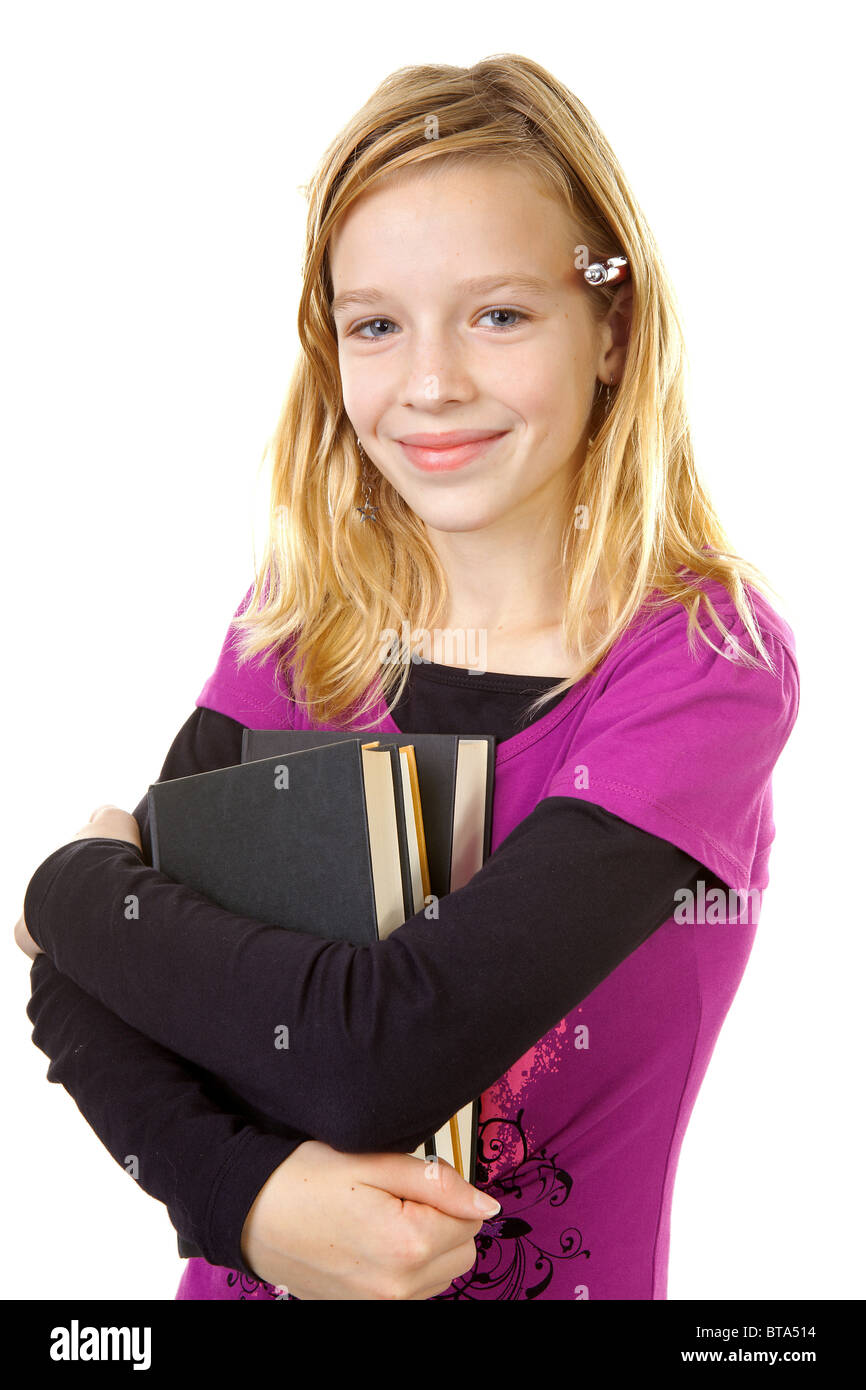 young girl carry books over white background Stock Photo - Alamy