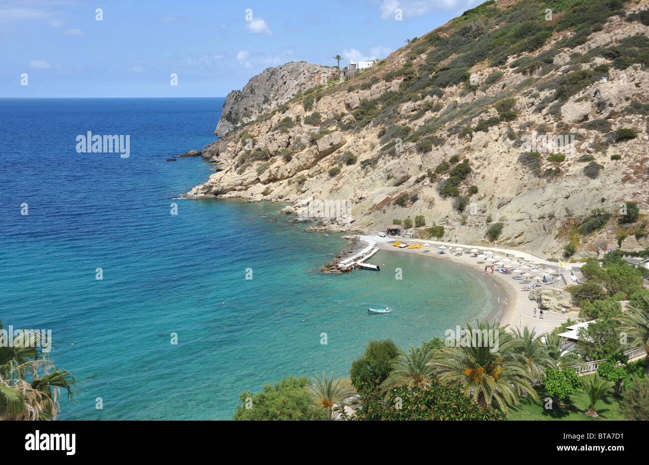 The small harbour and sandy beach at Istria Bay, northern Crete, Greece ...