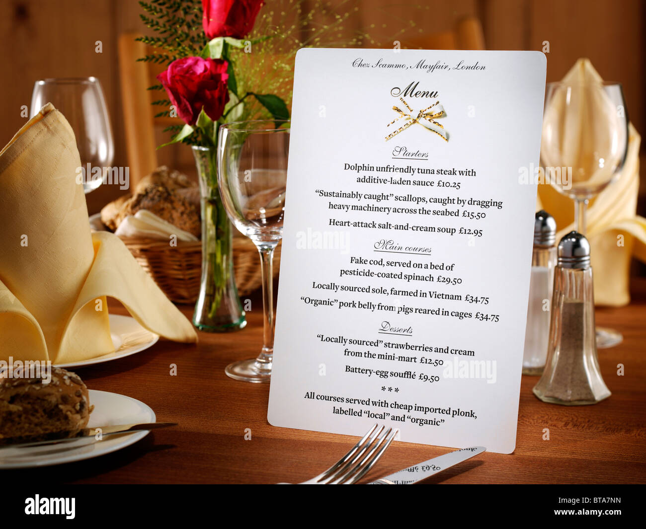 Menu in restaurant table setting Stock Photo - Alamy
