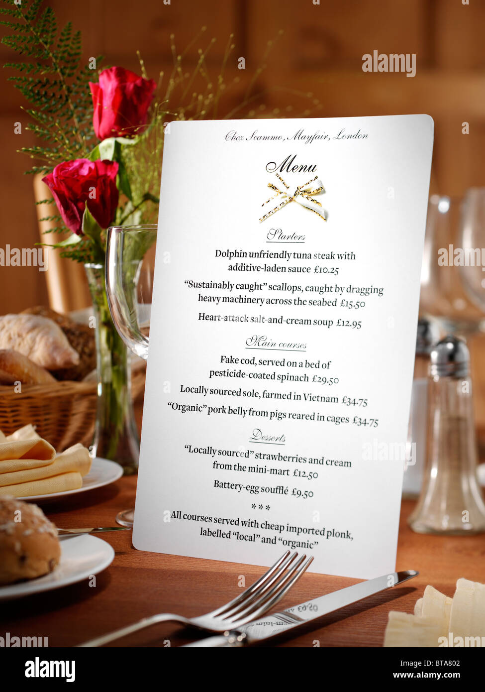 Menu in restaurant table setting Stock Photo - Alamy