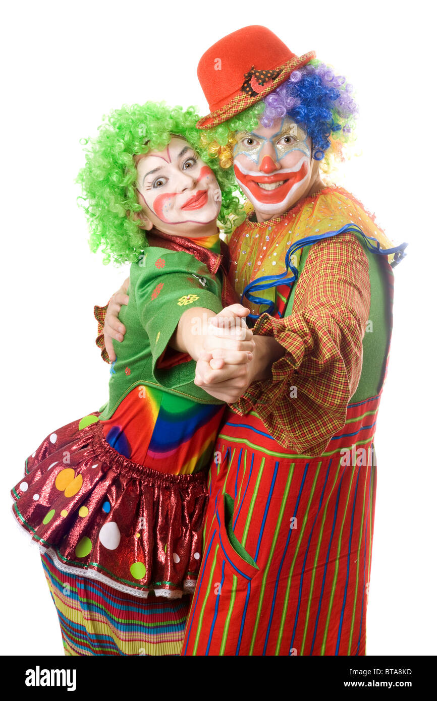 A couple of happy clowns dancing. Isolated Stock Photo - Alamy