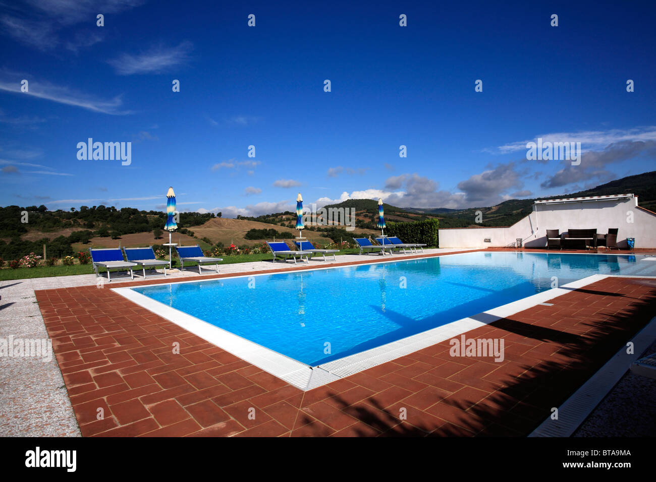 Pool deck chairs hi-res stock photography and images - Alamy
