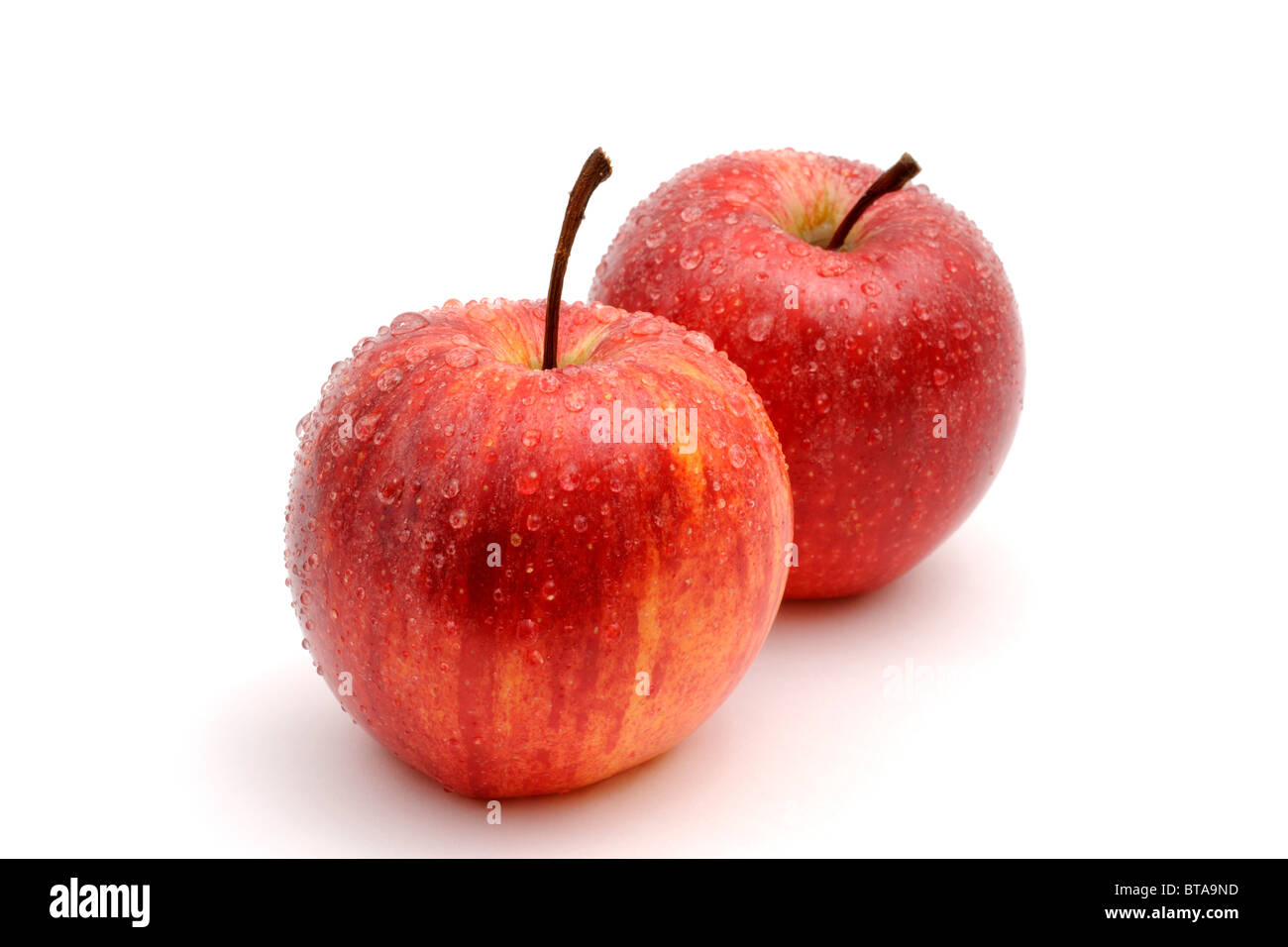 Two red apples Stock Photo - Alamy