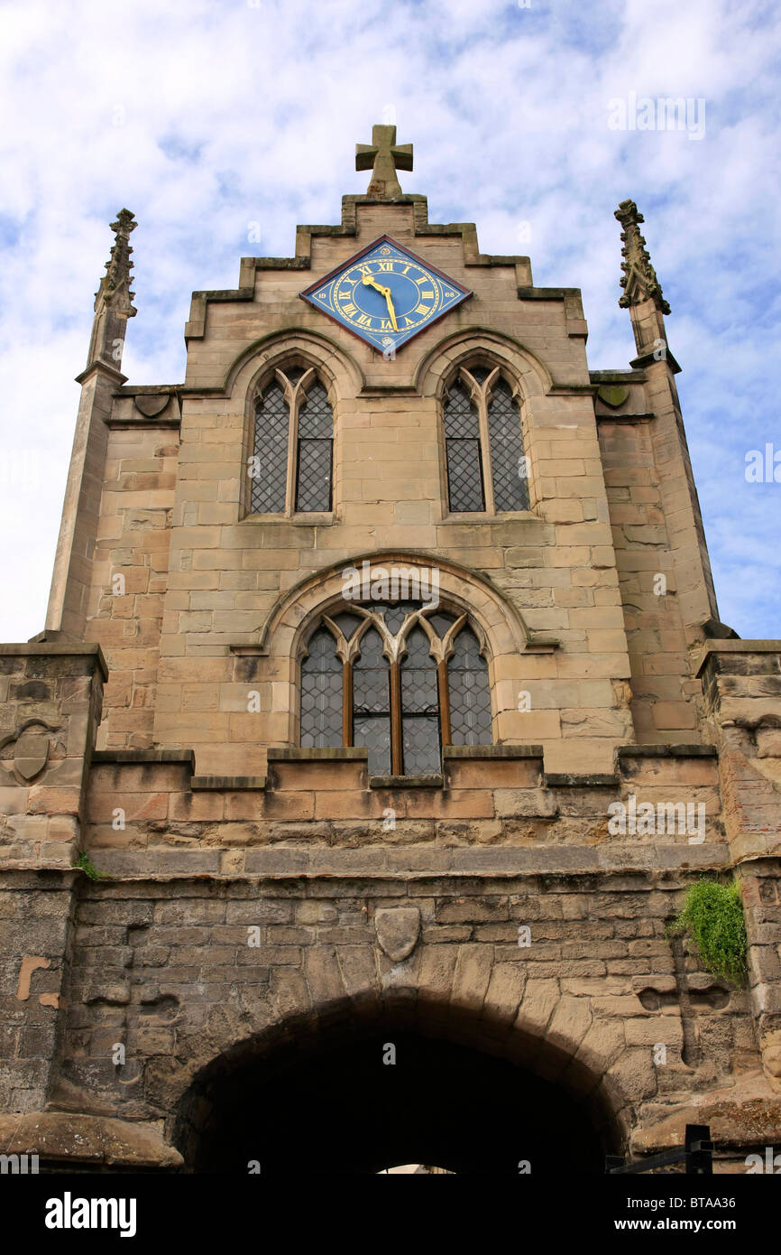 The medieval archway entrance to the city of Warwick and la clock tower ...