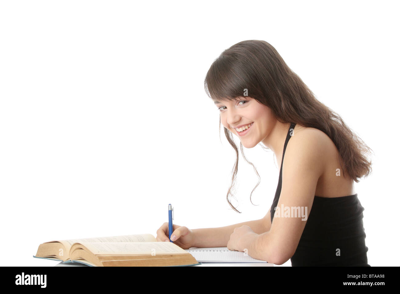 Teen girl learning at the desk, isolated on white Stock Photo - Alamy