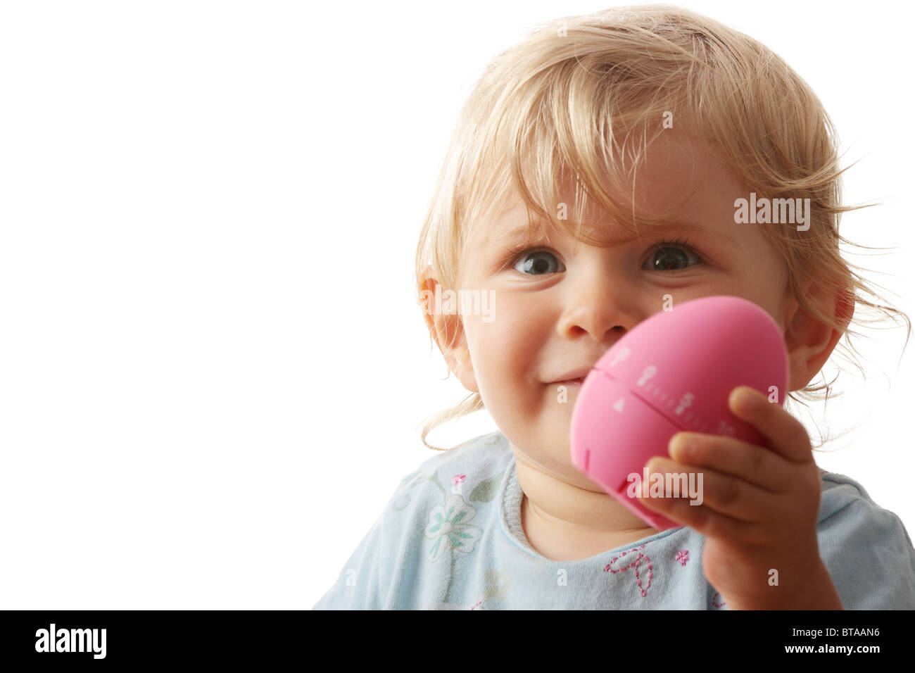 Small baby with a toy isolated Stock Photo - Alamy