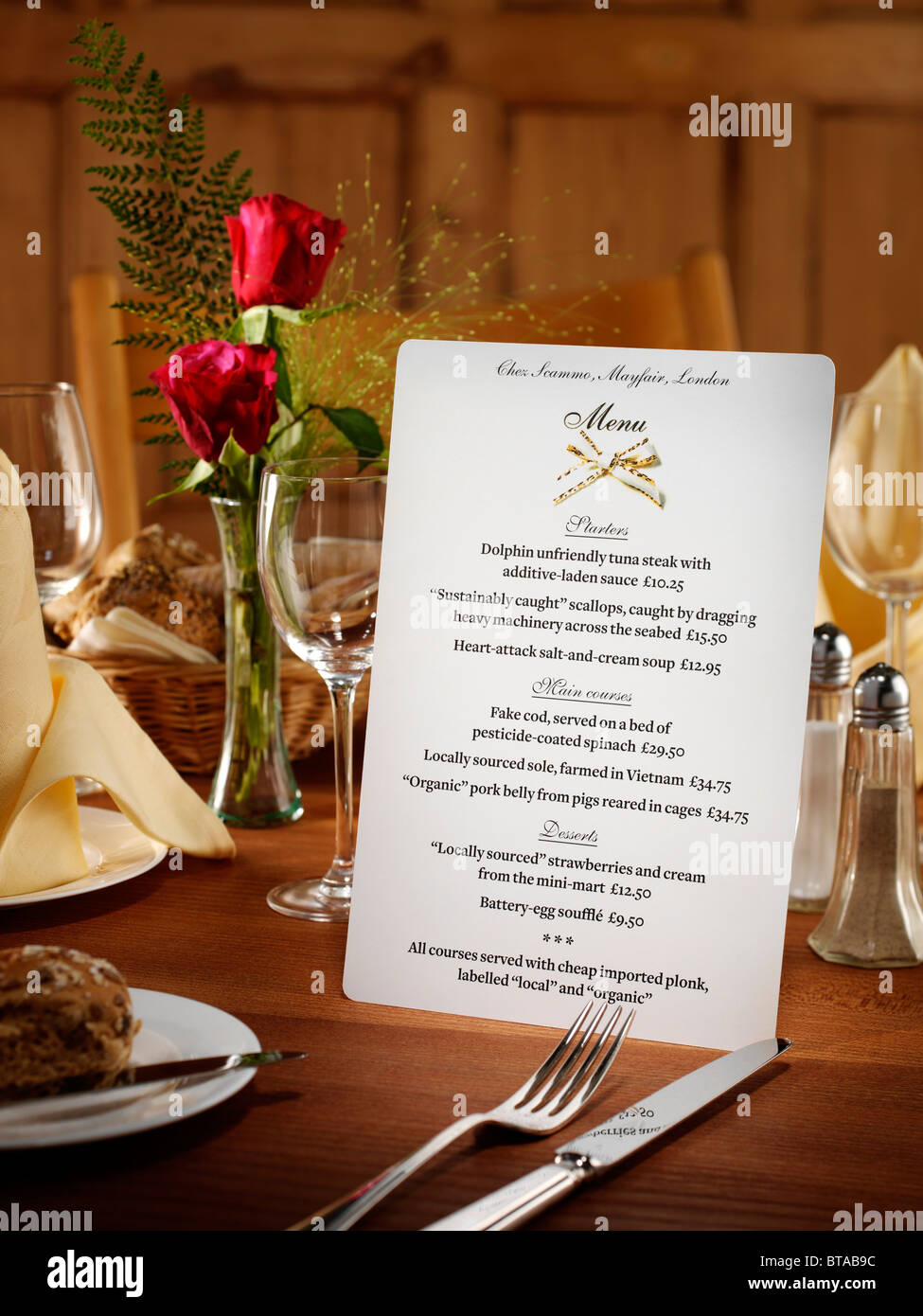 Menu in restaurant table setting Stock Photo - Alamy