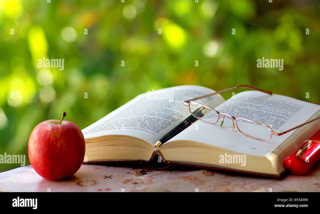 Old book, pen and glasses Stock Photo - Alamy