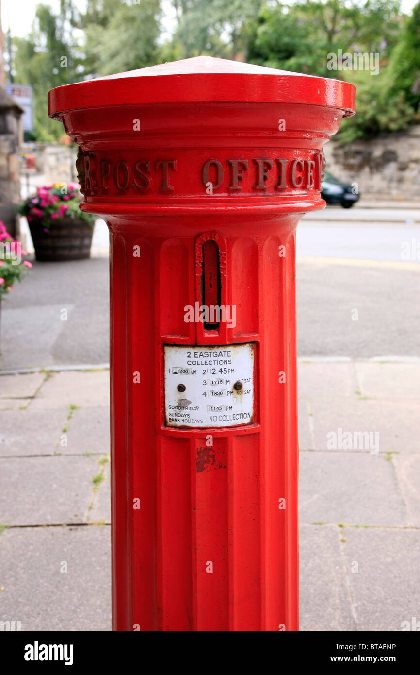 Royal Mail pillar box in Warwick. Cast in 1856 in the shape of a doric ...
