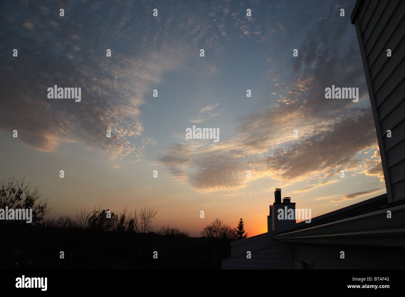 Clouds on rooftop hi-res stock photography and images - Alamy