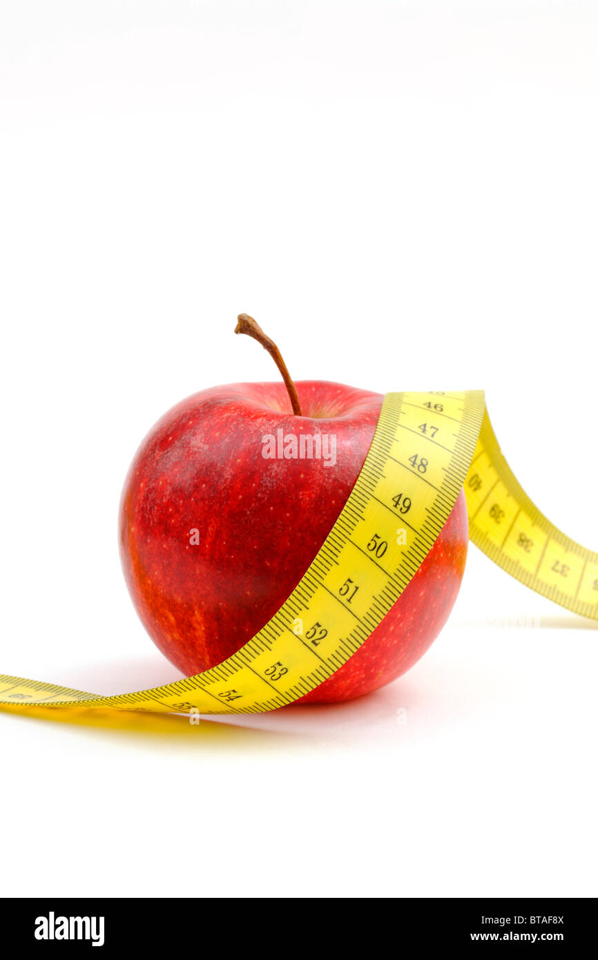 Apple with measuring tape Stock Photo - Alamy