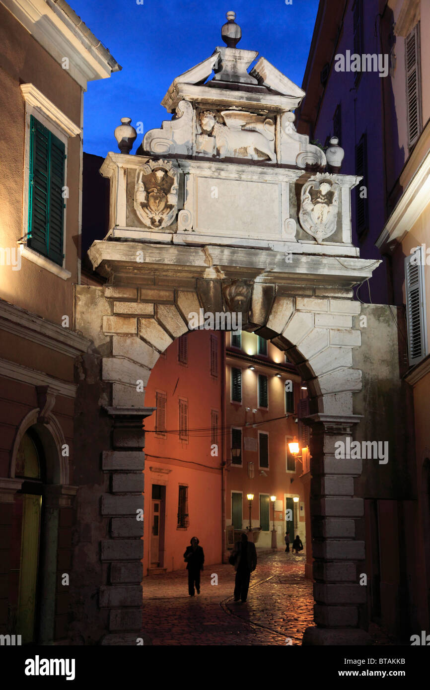 Croatia, Istria, Rovinj, Balbi Arch, Grisia Street, old town at night ...