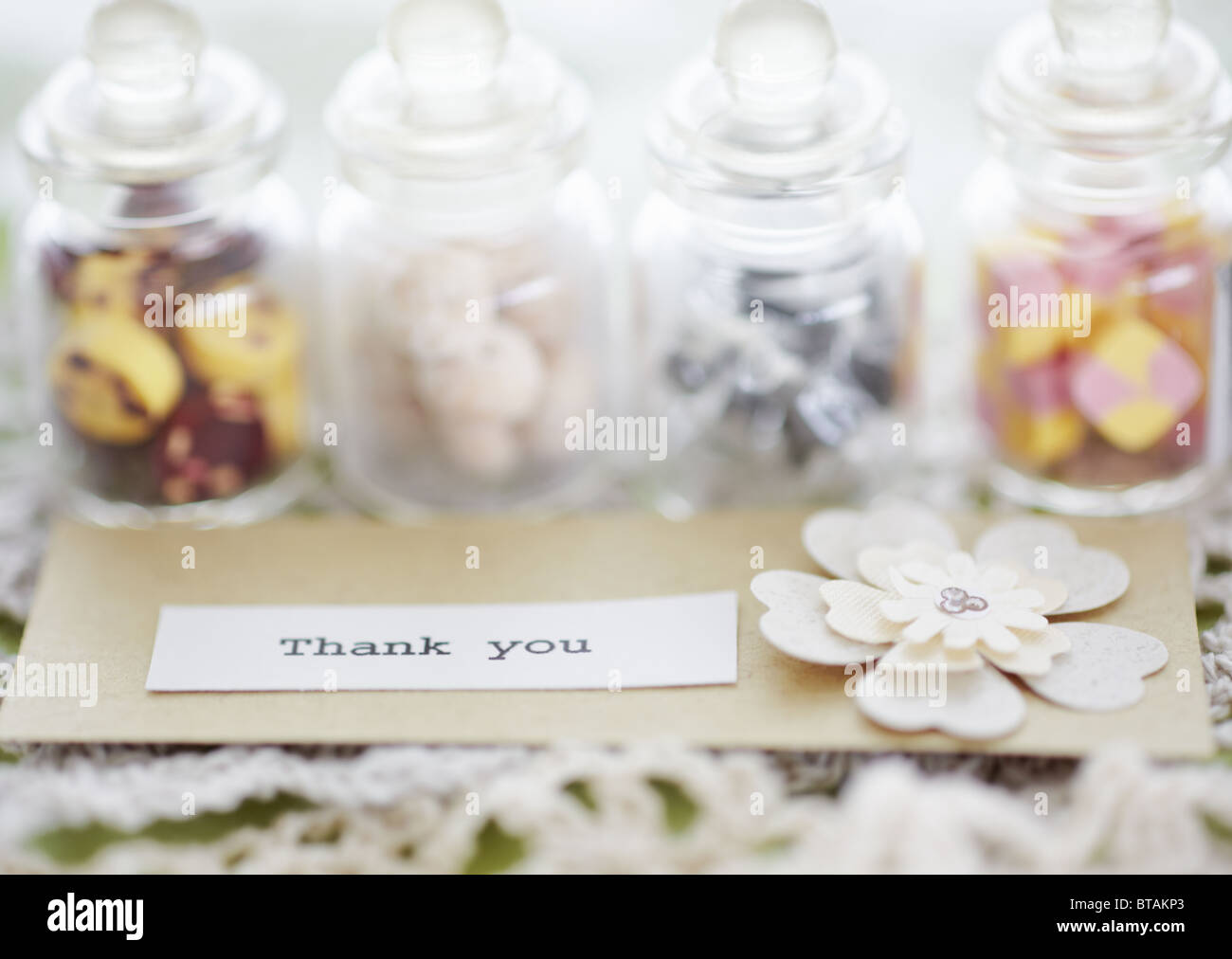 Candy pots with message Stock Photo - Alamy