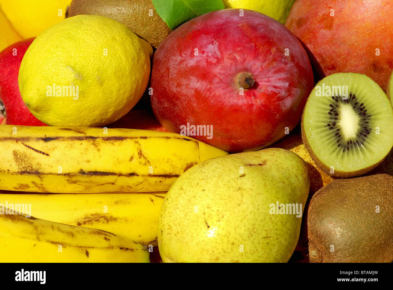Colored fruits background Stock Photo - Alamy