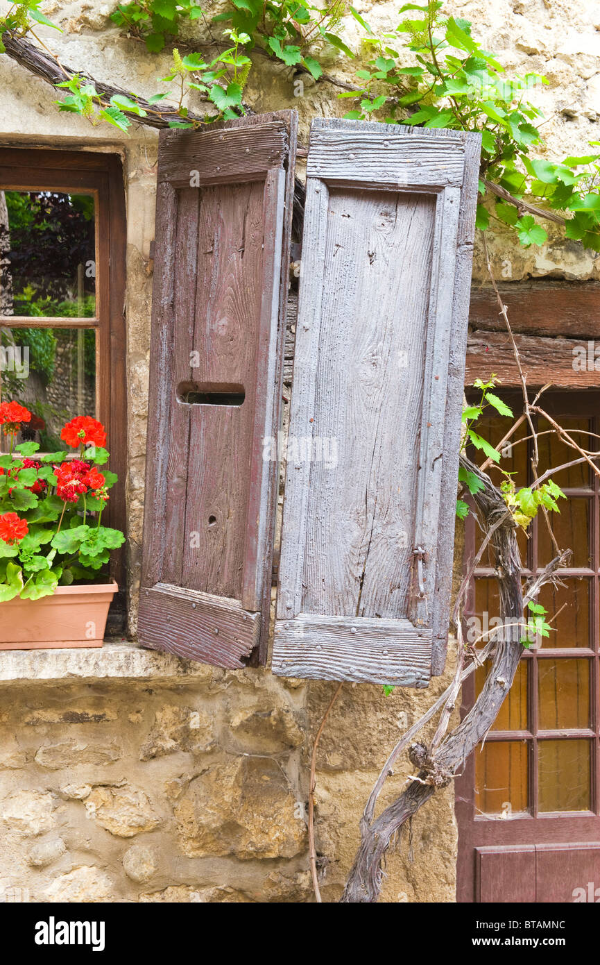 Window and shutter, Medieval walled town of Perouges, France Stock ...