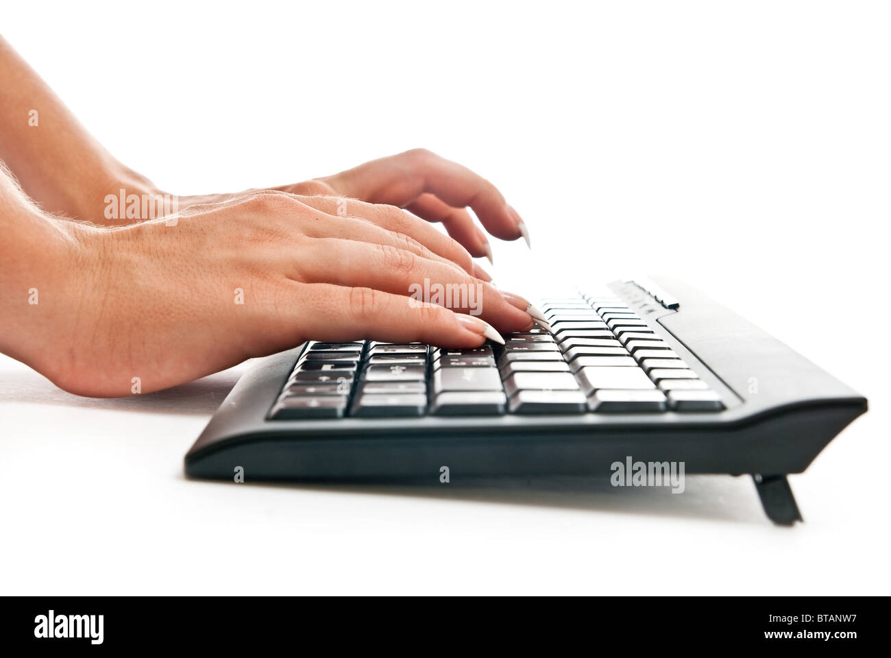 Keyboard and hands Stock Photo - Alamy
