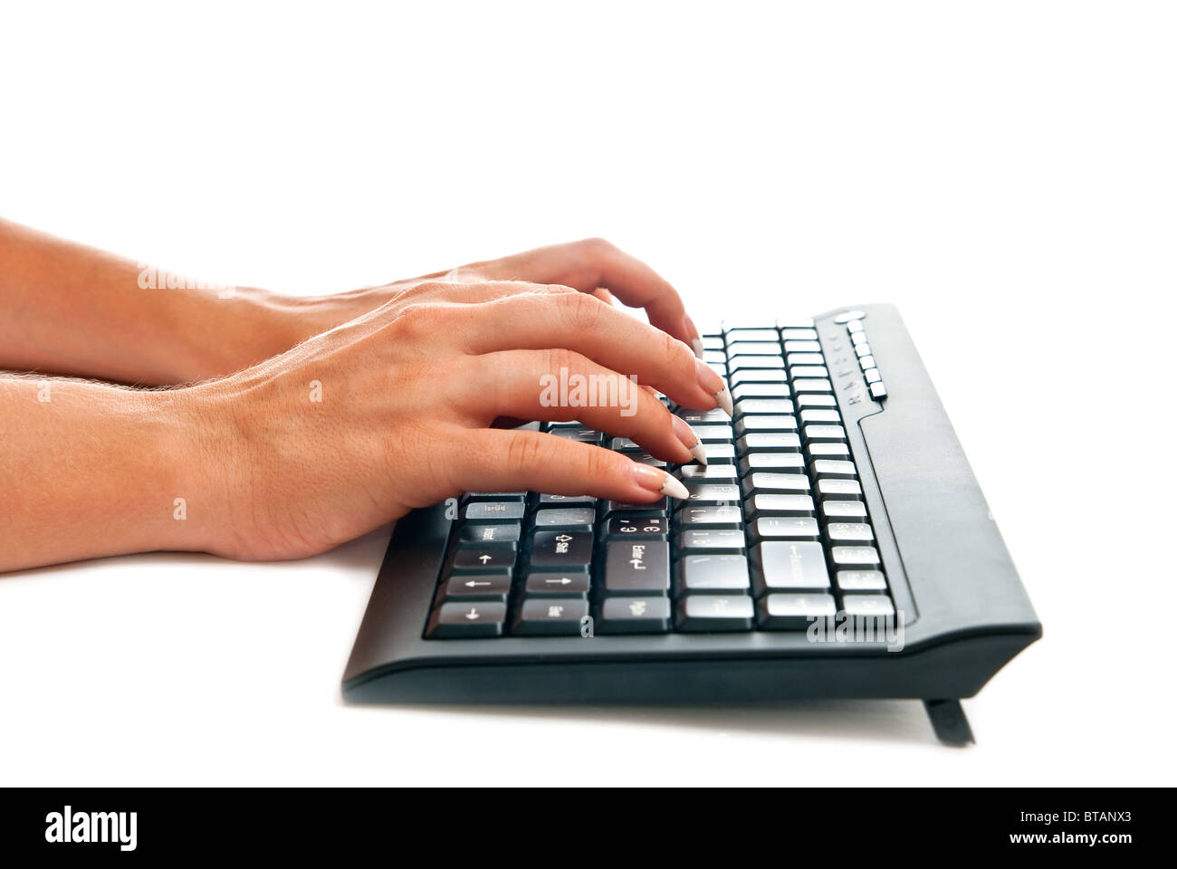 Keyboard and hands Stock Photo - Alamy