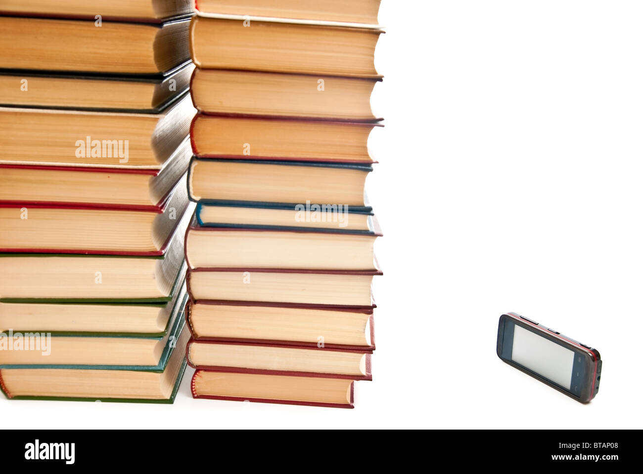 Books and mobile phone Stock Photo - Alamy
