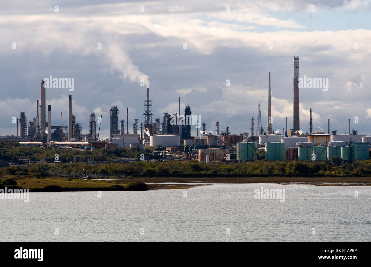 Fawley Oil refinery near Southampton with chimneys,gasometers and smoke ...