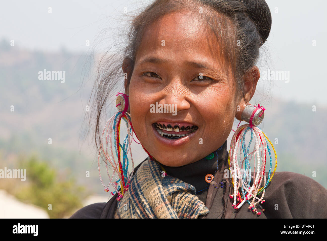 A smiling Eng (Ann) minority woman Stock Photo - Alamy