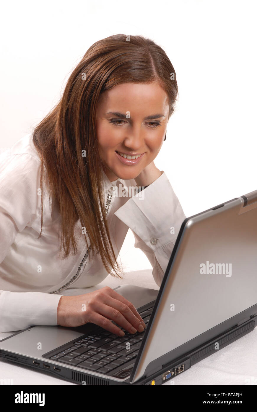 woman with a laptop and long hair Stock Photo - Alamy