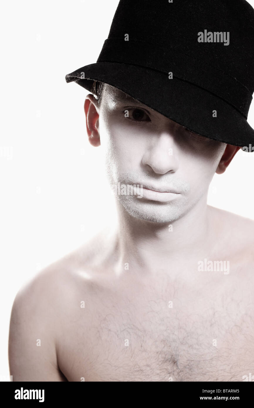 Face handsome young guy with white makeup and black hat isolated Stock ...
