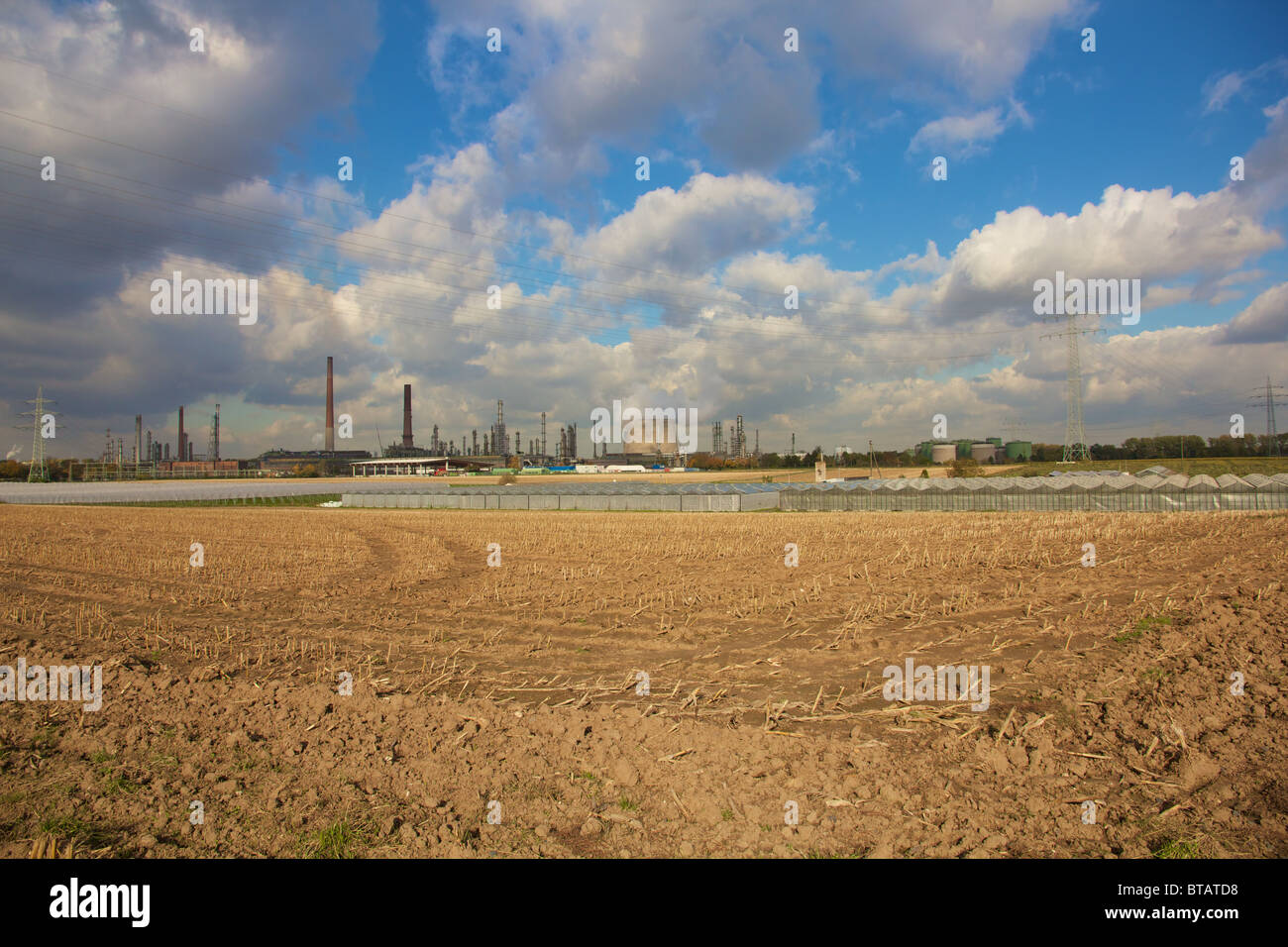 Industrie plant in combination with agriculutral field Stock Photo - Alamy
