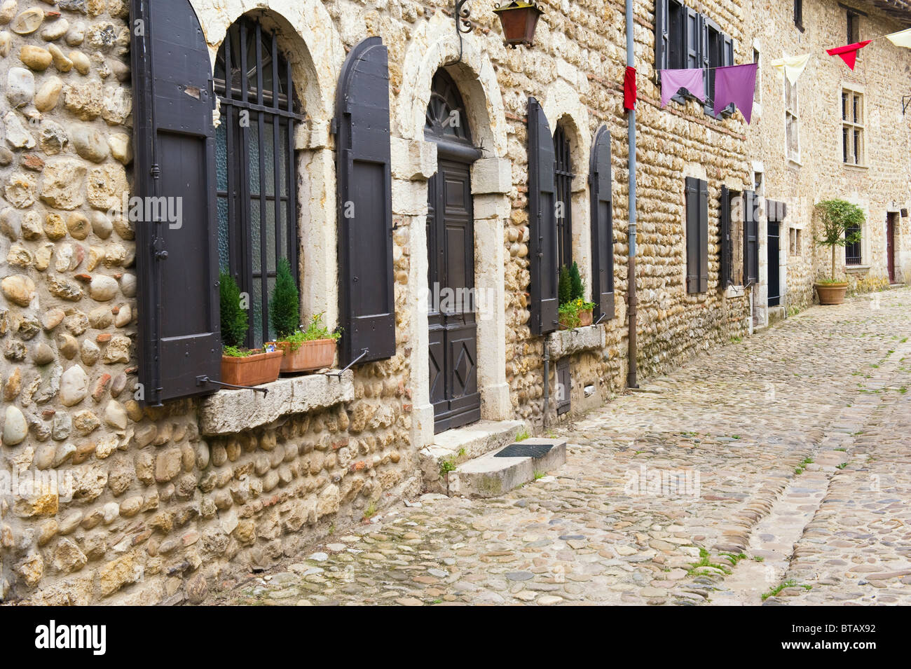 Cobblestone street, Medieval walled town of Perouges, France Stock ...