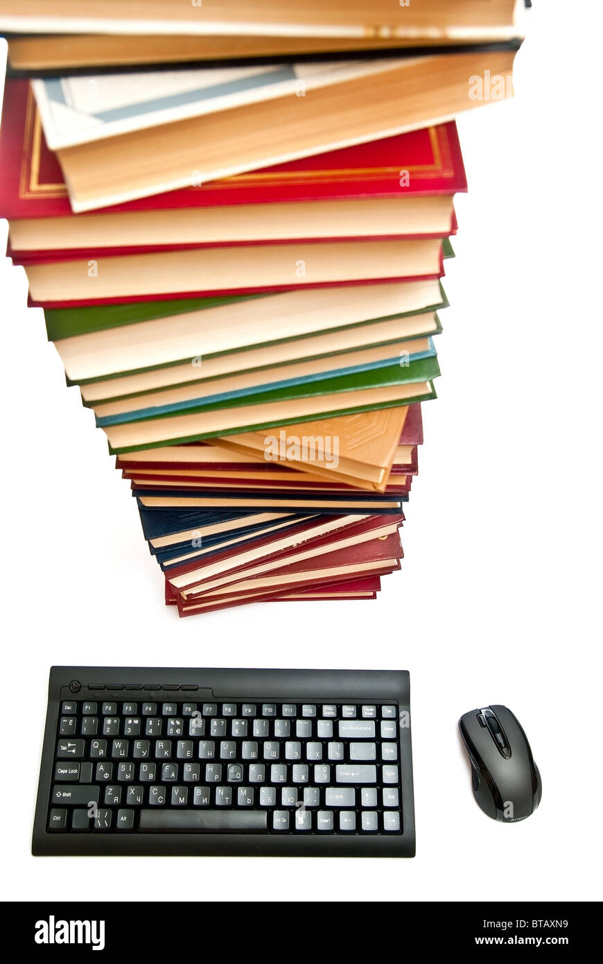 Keyboard and book Stock Photo - Alamy