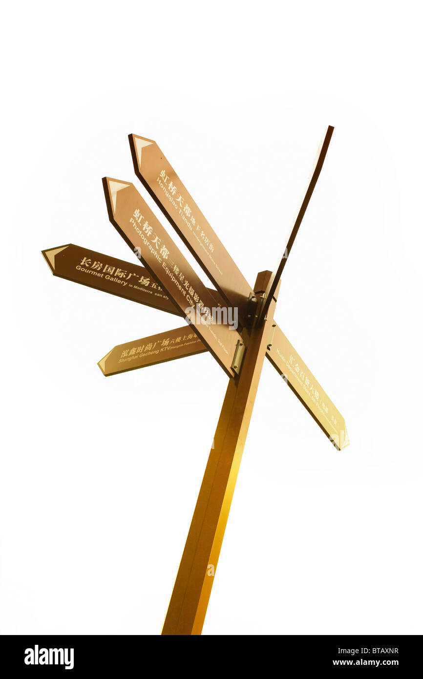 Chinese and English Signpost at shanghai road with isolated background ...