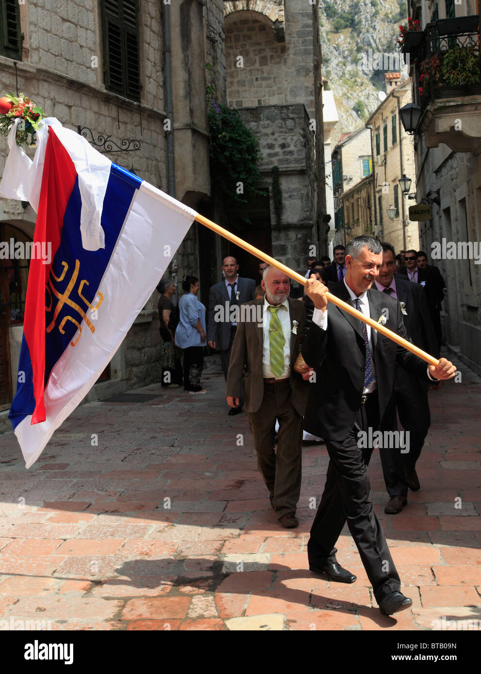 Montenegro, Kotor, wedding procession, flag bearer, people Stock Photo ...