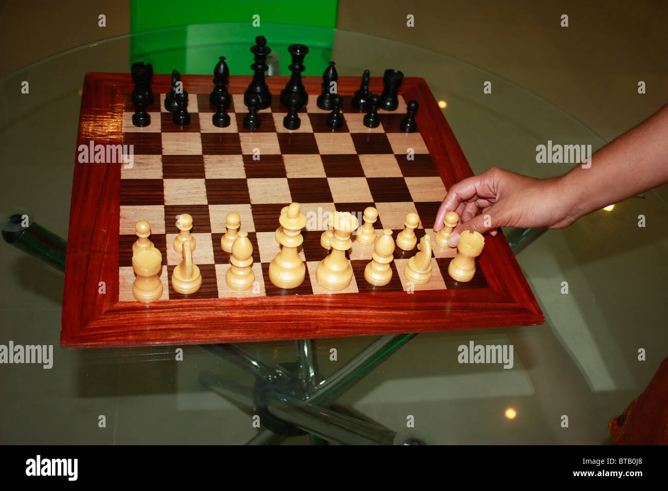 A person playing chess Stock Photo - Alamy