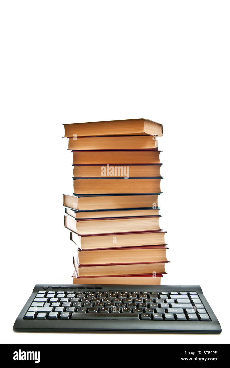 Keyboard and book Stock Photo - Alamy