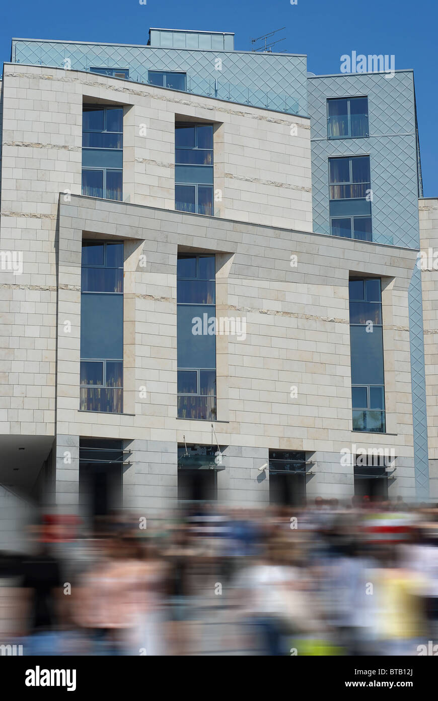 blurred crowd on a modern building background Stock Photo - Alamy